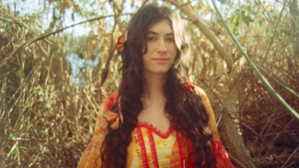 This artist's debut song is a sexy girl squad anthem